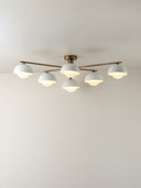 Porsa - 6 light aged brass and warm white porcelain flush